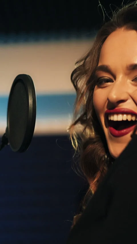 Beautiful young singer who recorded a so... | Stock Video | Pond5