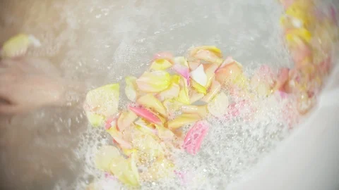 Beautiful young woman relaxes in a bath ... | Stock Video | Pond5