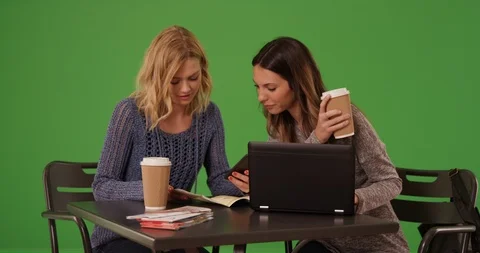 Beautiful young women using tech to loca... | Stock Video | Pond5