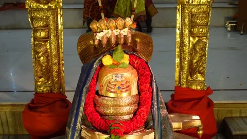 Beautifully decorated Shivling. Devotees... | Stock Video | Pond5