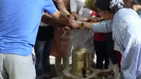 Beautifully decorated Shivling. Devotees... | Stock Video | Pond5