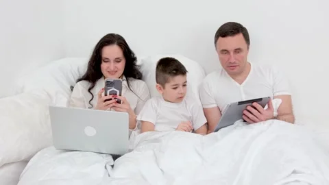 bed linen advertising family watching mo... | Stock Video | Pond5