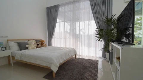 Bedroom interior design with big window. | Stock Video | Pond5