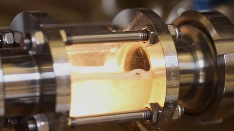 Beer flowing through the Sight Glass of ... | Stock Video | Pond5