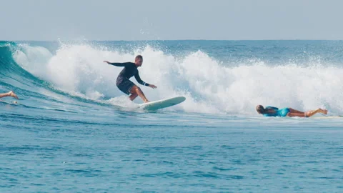 Beginner surfer surfs the wave in the Ma... | Stock Video | Pond5