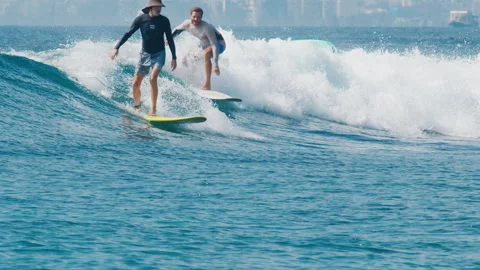 Beginner surfer surfs the wave in the Ma... | Stock Video | Pond5