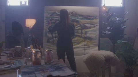 From Behind Artist with Long Hair in Jum... | Stock Video | Pond5