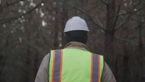 From Behind Logger in Hard Hat and Safet... | Stock Video | Pond5