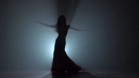 Belly dancer shaking her hips in chiffon... | Stock Video | Pond5