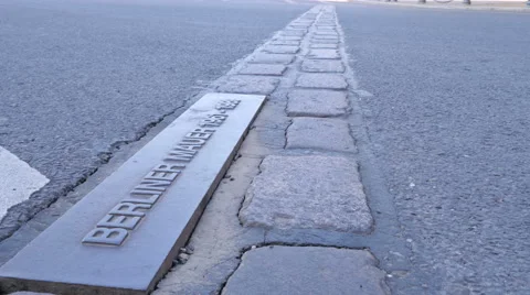 berlin wall sign mark on street pavement... | Stock Video | Pond5