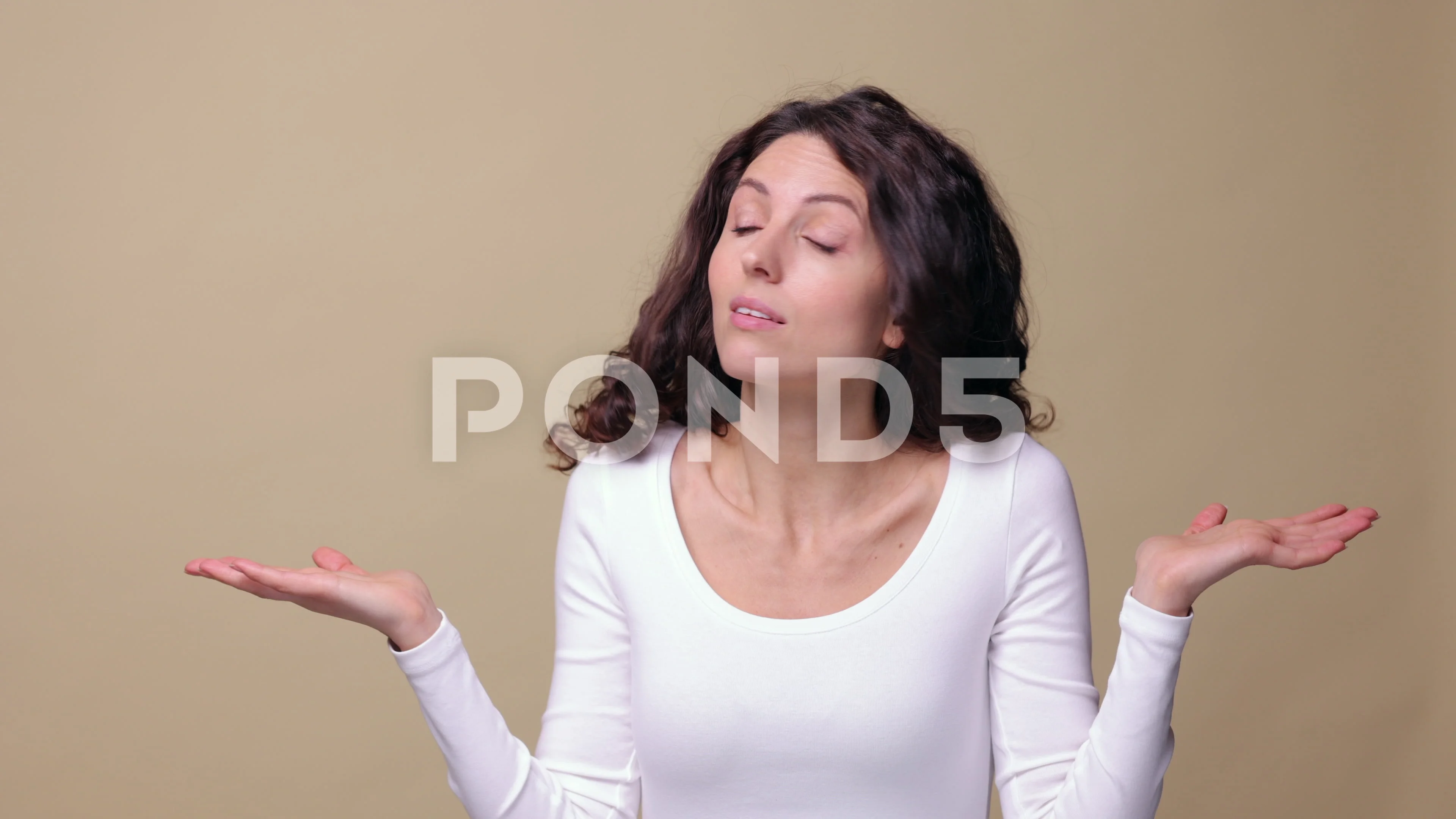 Woman Shrugging Shoulders