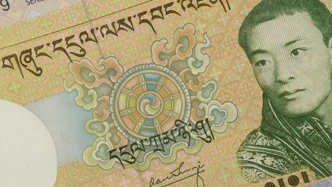 Bhutan ngultrum notes rotating. Bhutanes... | Stock Video | Pond5