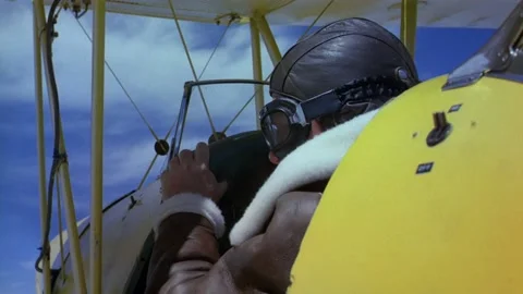 Bi-plane cockpit in flight behind pilot | Stock Video | Pond5