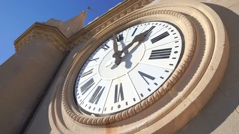 Big ancient clock face on the wall of th... | Stock Video | Pond5