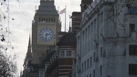 The Big Ben tower behind the buildings w... | Stock Video | Pond5