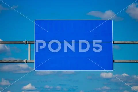 Big blank highway road sign with gradient blue sky Stock Photo #91398485
