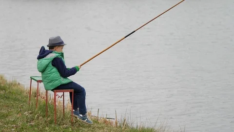 Big boy fishing in the lake | Stock Video | Pond5