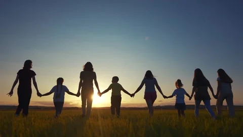 big community family in the park. silhou... | Stock Video | Pond5