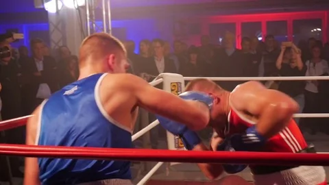 Big crowd is watching the boxing match | Stock Video | Pond5