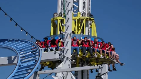 Big drop ride. Scary people sitting on a... | Stock Video | Pond5