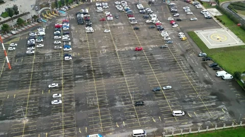 Big empty car parking lot by the seaside... | Stock Video | Pond5