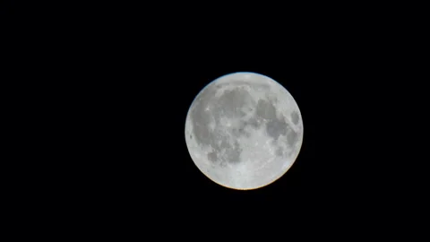 Big full moon sets in the night sky. Moo... | Stock Video | Pond5