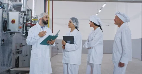 In a big manufacturing industry man engi... | Stock Video | Pond5