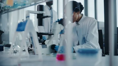 Big Medical Laboratory Scientist Using M... | Stock Video | Pond5