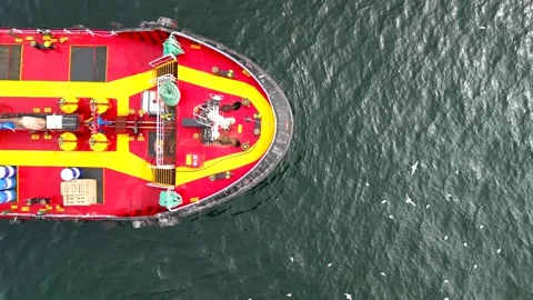 Big red boat moving into the drone shot ... | Stock Video | Pond5