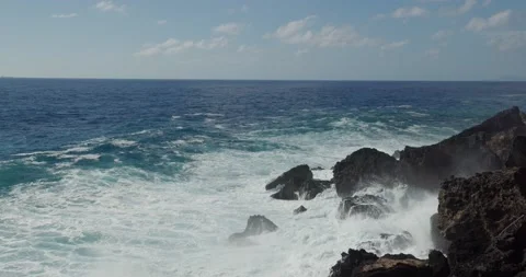 Big sea wave splash on shoal rock | Stock Video | Pond5