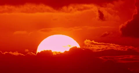 Big sun slowly rising time lapse, red da... | Stock Video | Pond5