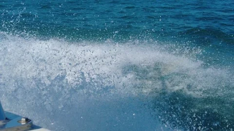 Big Water Splash Wake With Small Rainbow... | Stock Video | Pond5