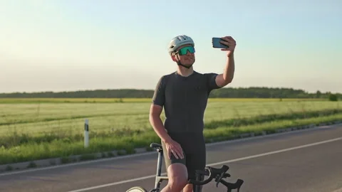 Bike rider talking via video call app on... | Stock Video | Pond5