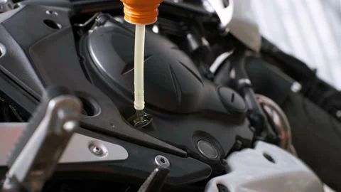 Motorcycle Oil Change Stock Video Footage | Royalty Free Motorcycle Oil ...