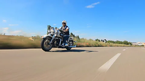 biker motorbike ride follow shot | Stock Video | Pond5