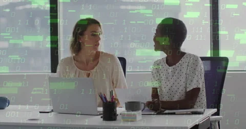 Binary code animation over two women wor... | Stock Video | Pond5