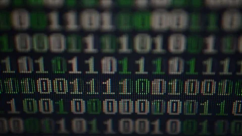 Binary code on the monitor screen. | Stock Video | Pond5