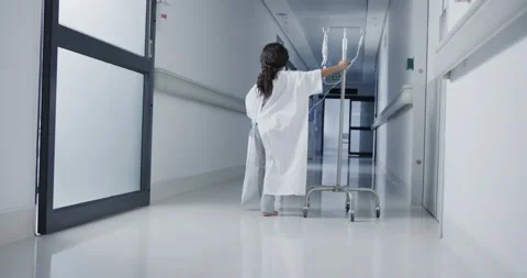 Biracial sick girl patient walking with ... | Stock Video | Pond5