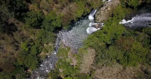Bird eye view of a waterfall in the midd... | Stock Video | Pond5
