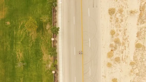 Birds Eye Aerial View of Cyclists Riding... | Stock Video | Pond5