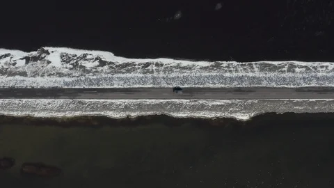 Bird's Eye View of a Car Driving Along a... | Stock Video | Pond5