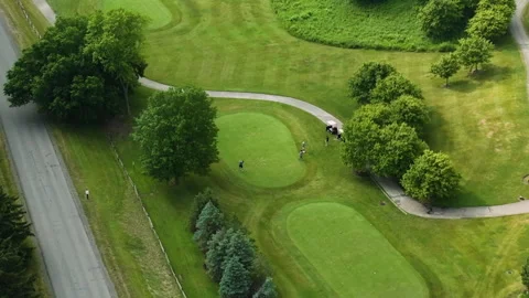 Bird's eye view of golfer ready to swing... | Stock Video | Pond5
