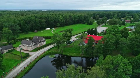 Bird's eye view of a mansion on a lake i... | Stock Video | Pond5