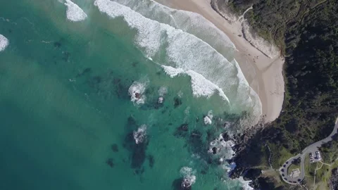 Bird's Eye View Over Lighthouse Beach Wi... | Stock Video | Pond5
