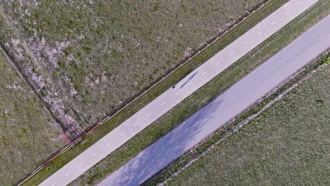 birds eye view of people walking on a tr... | Stock Video | Pond5