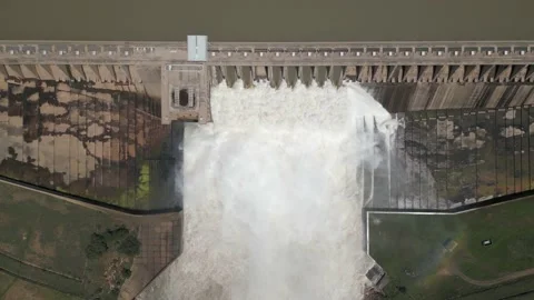 Bird's eye view of power dam releasing w... | Stock Video | Pond5