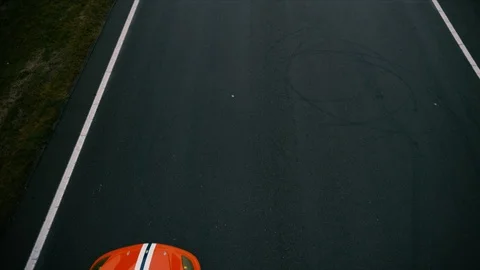 Birds eye view of red sports car driving... | Stock Video | Pond5