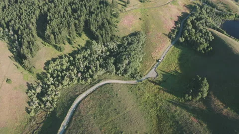 Bird’s eye view of vehicle driving on ... | Stock Video | Pond5