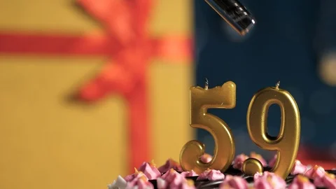 Birthday cake number 59 golden candles b... | Stock Video | Pond5