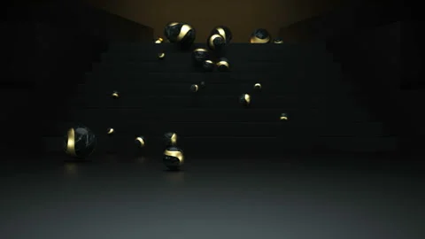 Black and gold marble balls fall down th... | Stock Video | Pond5